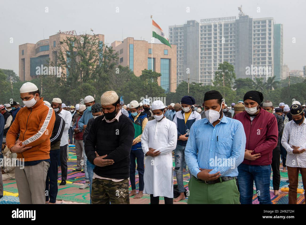 Indian Muslims perform Friday prayers in an open Ground at the ...