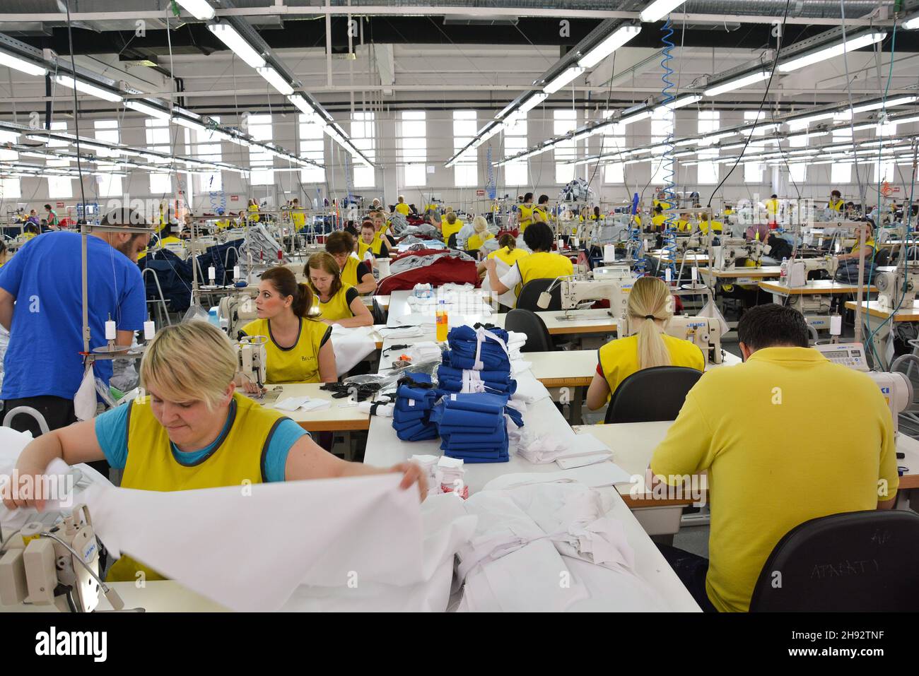 MAGLAJ, BOSNIA AND HERZEGOVINA - Jul 14, 2021: A large sewing factory full of hard workers in ...