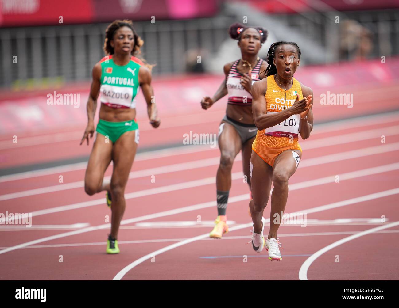 Marie-Josée Ta Lou competing in the 100 meters of the Tokyo 2020 ...