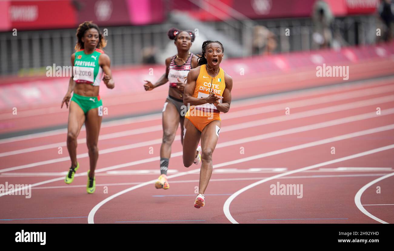 Marie-Josée Ta Lou competing in the 100 meters of the Tokyo 2020 ...