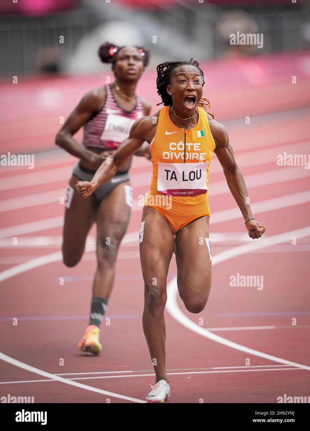 Marie-Josée Ta Lou competing in the 100 meters of the Tokyo 2020 ...