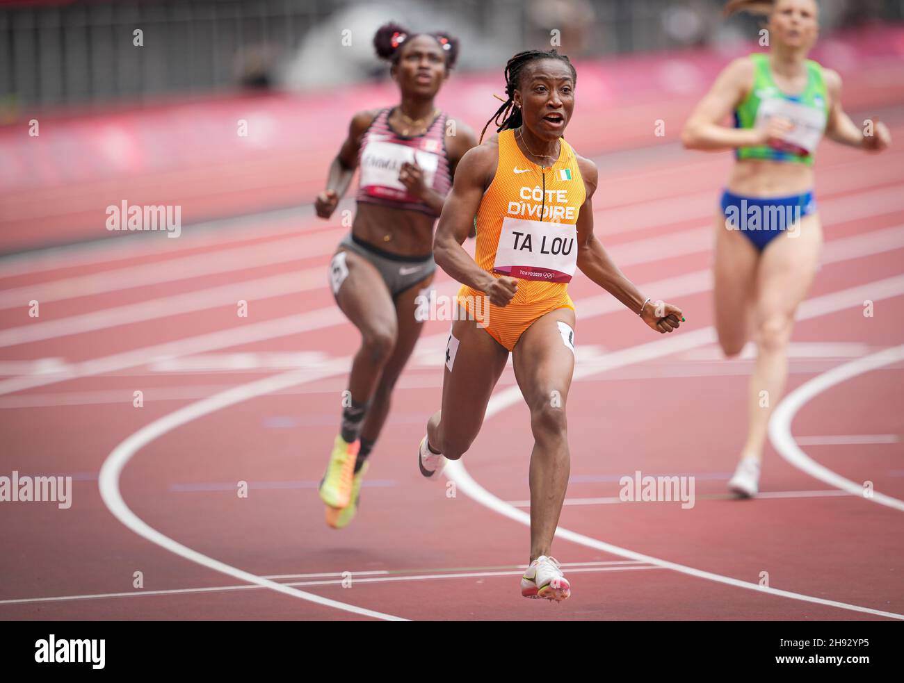 Marie-Josée Ta Lou competing in the 100 meters of the Tokyo 2020 ...