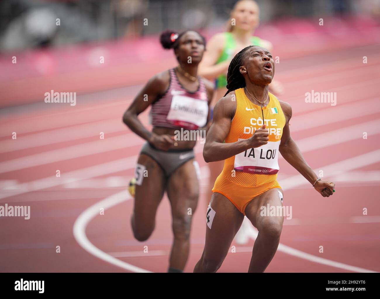 Marie-Josée Ta Lou competing in the 100 meters of the Tokyo 2020 ...