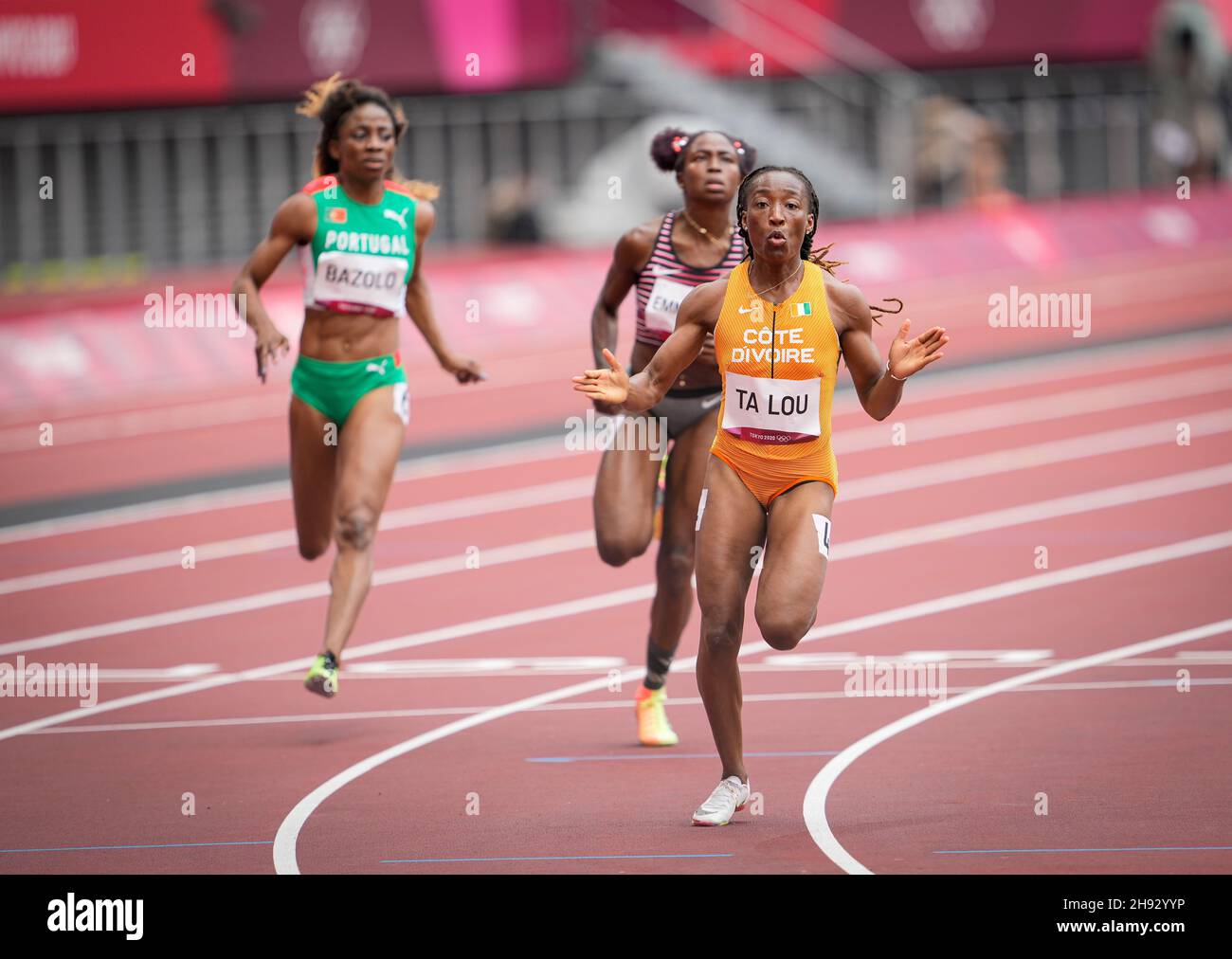 Marie-Josée Ta Lou competing in the 100 meters of the Tokyo 2020 ...