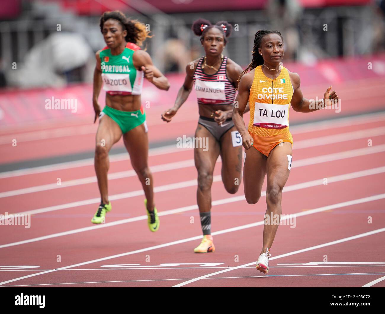 Marie-Josée Ta Lou competing in the 100 meters of the Tokyo 2020 ...