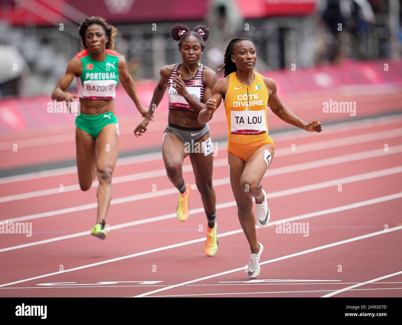 Marie-Josée Ta Lou competing in the 100 meters of the Tokyo 2020 ...