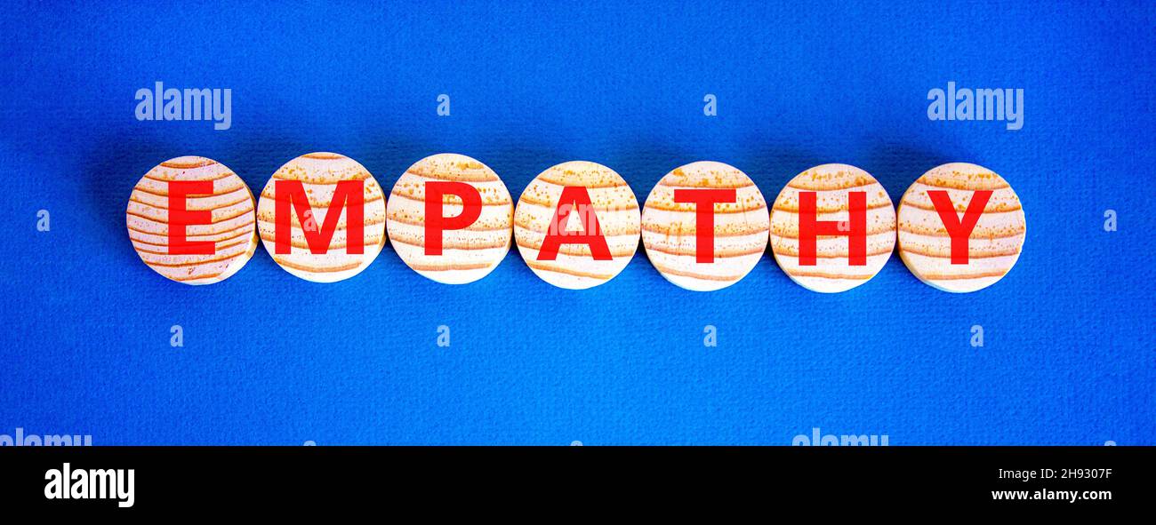 Empathy symbol. The concept word Empathy on wooden circles. Beautiful ...