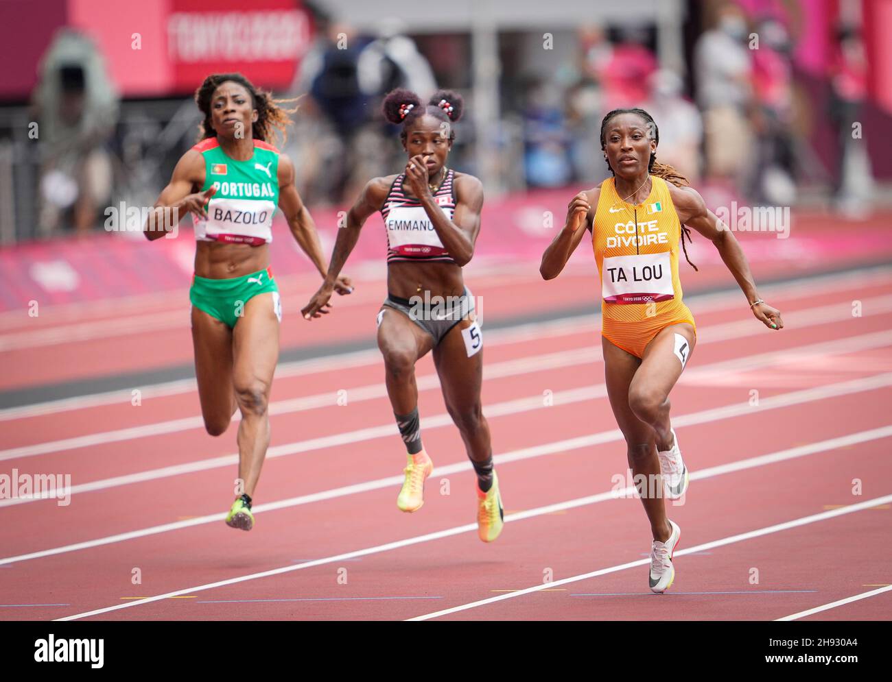 Marie-Josée Ta Lou competing in the 100 meters of the Tokyo 2020 ...