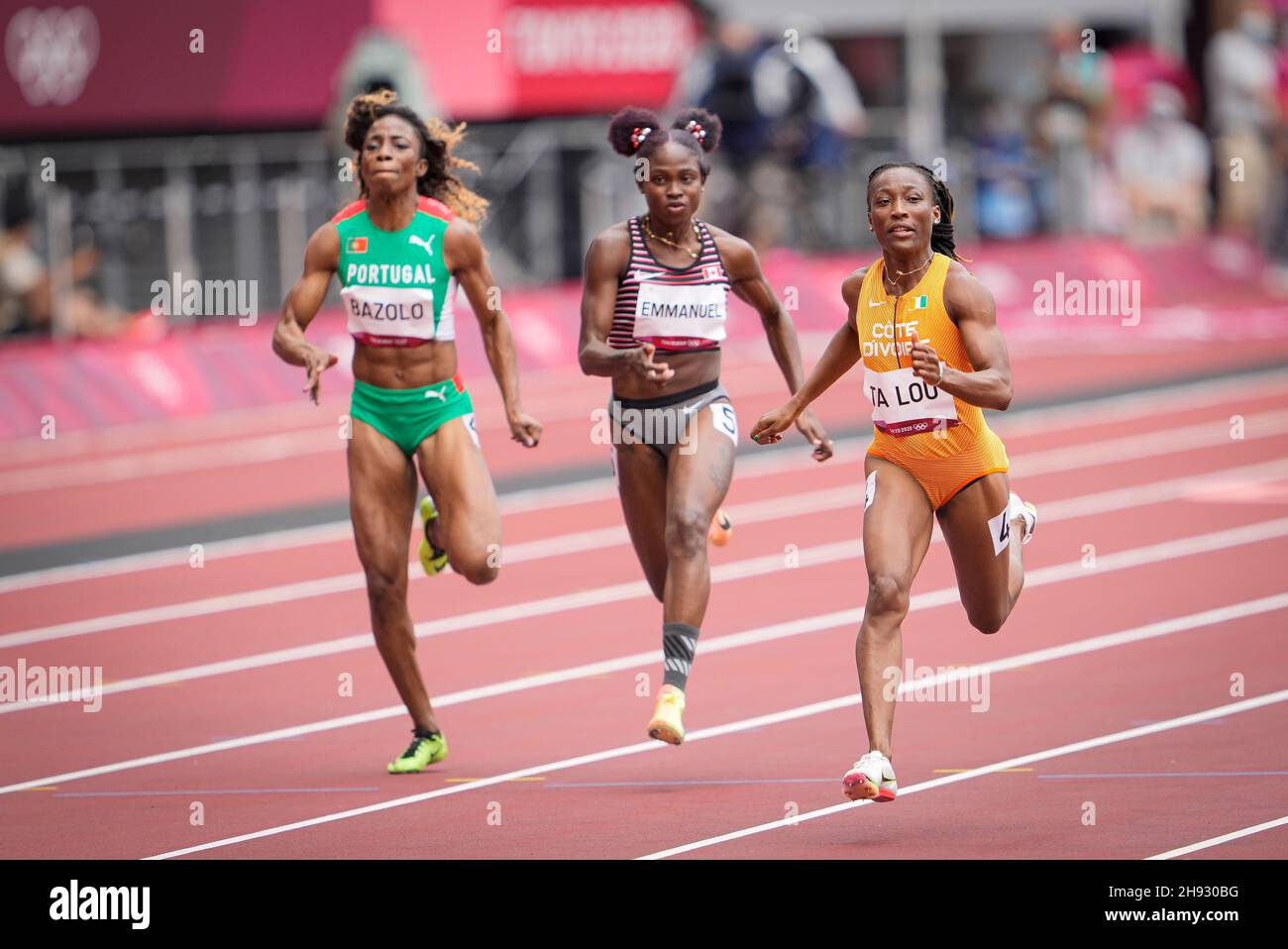 Marie-Josée Ta Lou competing in the 100 meters of the Tokyo 2020 ...