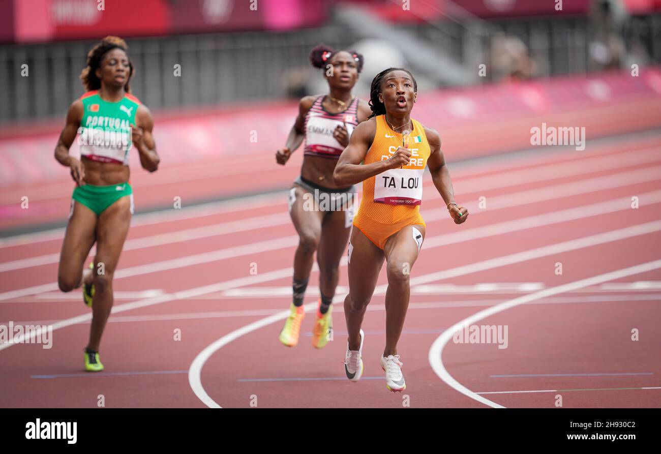 Marie-Josée Ta Lou competing in the 100 meters of the Tokyo 2020 ...