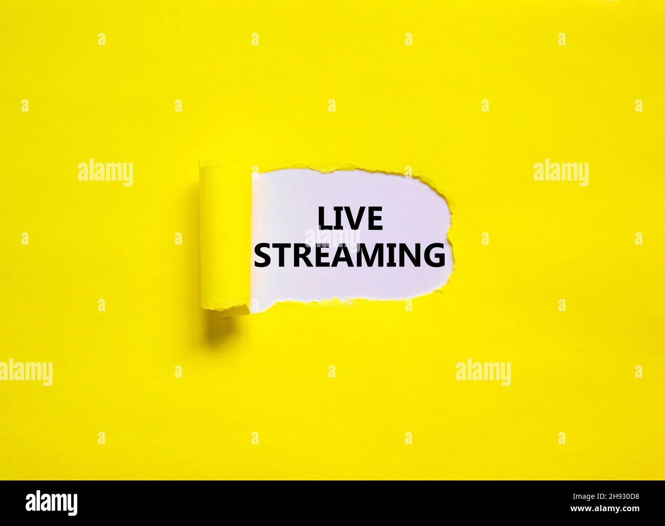 Live streaming symbol. Concept words Live streaming appearing behind ...