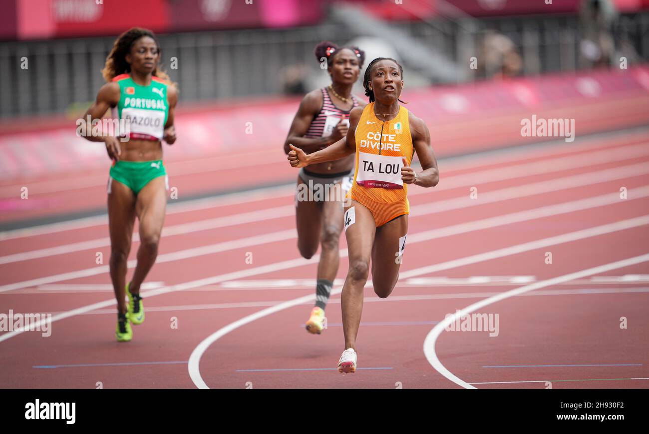 Marie-Josée Ta Lou competing in the 100 meters of the Tokyo 2020 ...