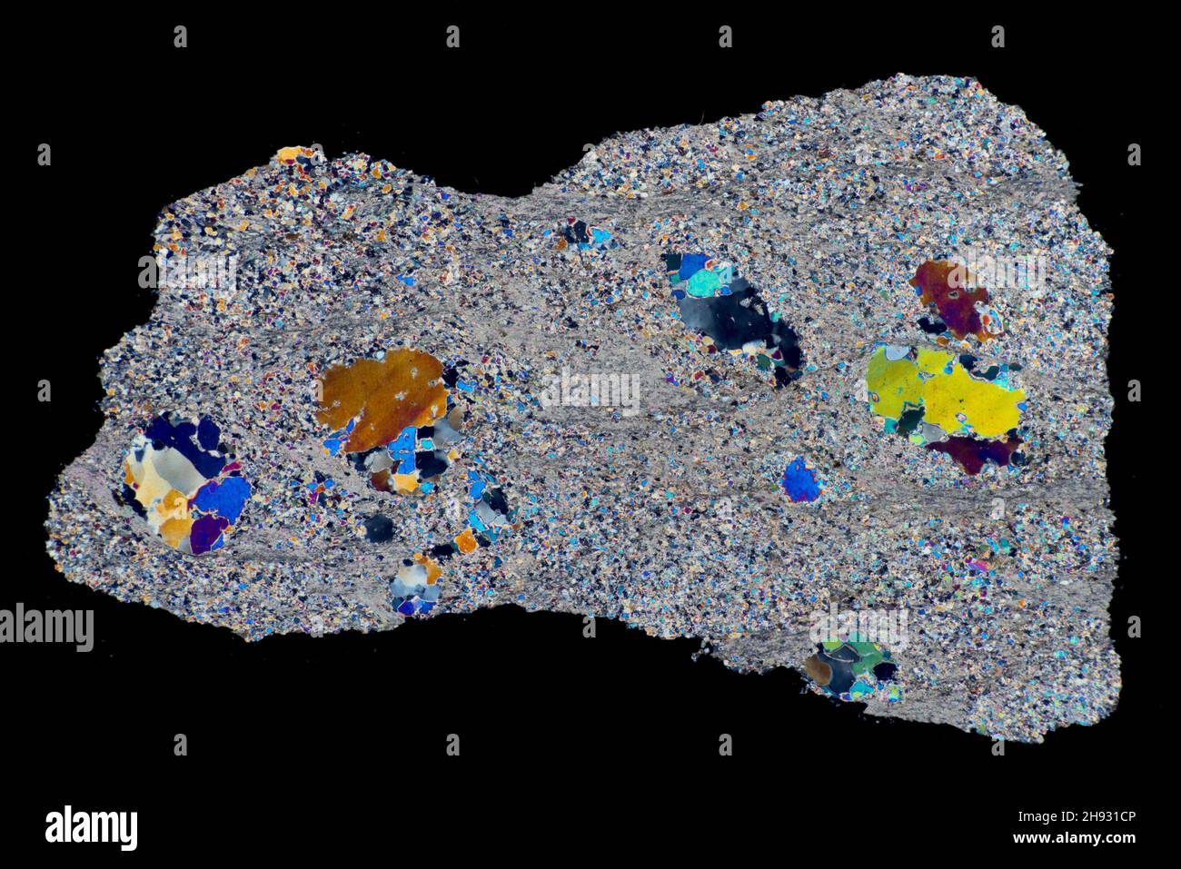 Quartz schist mineral, thin section viewed with polarized lighting ...