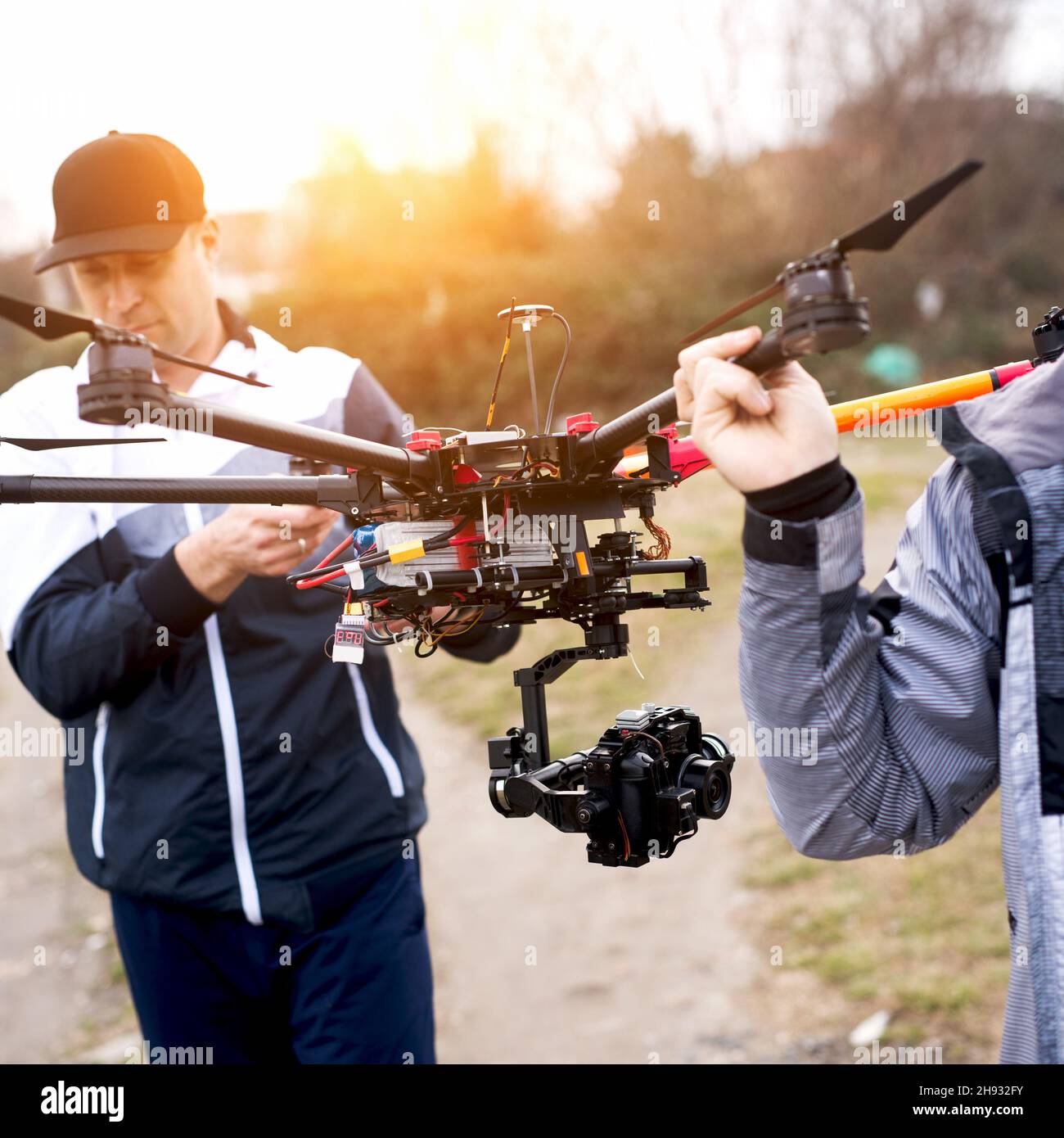 Future of recording filming photographing. Preparing drone for take of ...