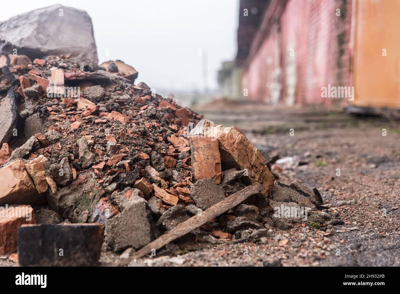 A bunch of industrial waste stone and brick. Garbage dirty disposal and ...
