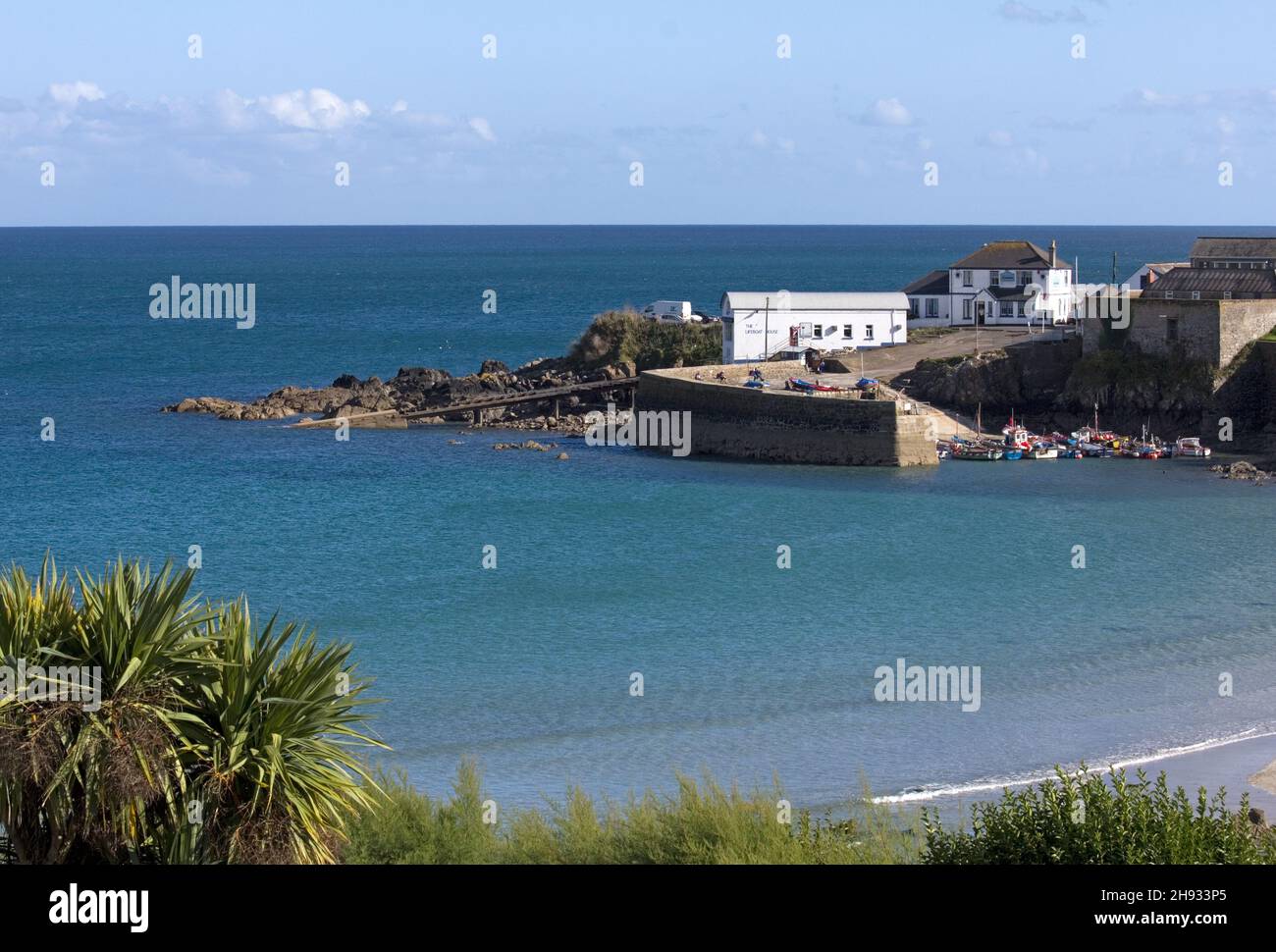 The old Coverack lifeboat station, Coverack harbour, the Paris Inn and ...