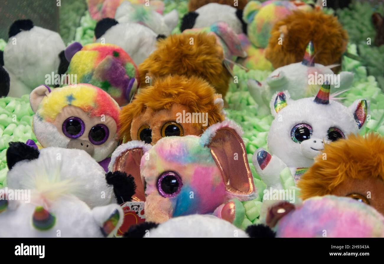 Teddy bear prizes in a grab machine arcade game Stock Photo - Alamy