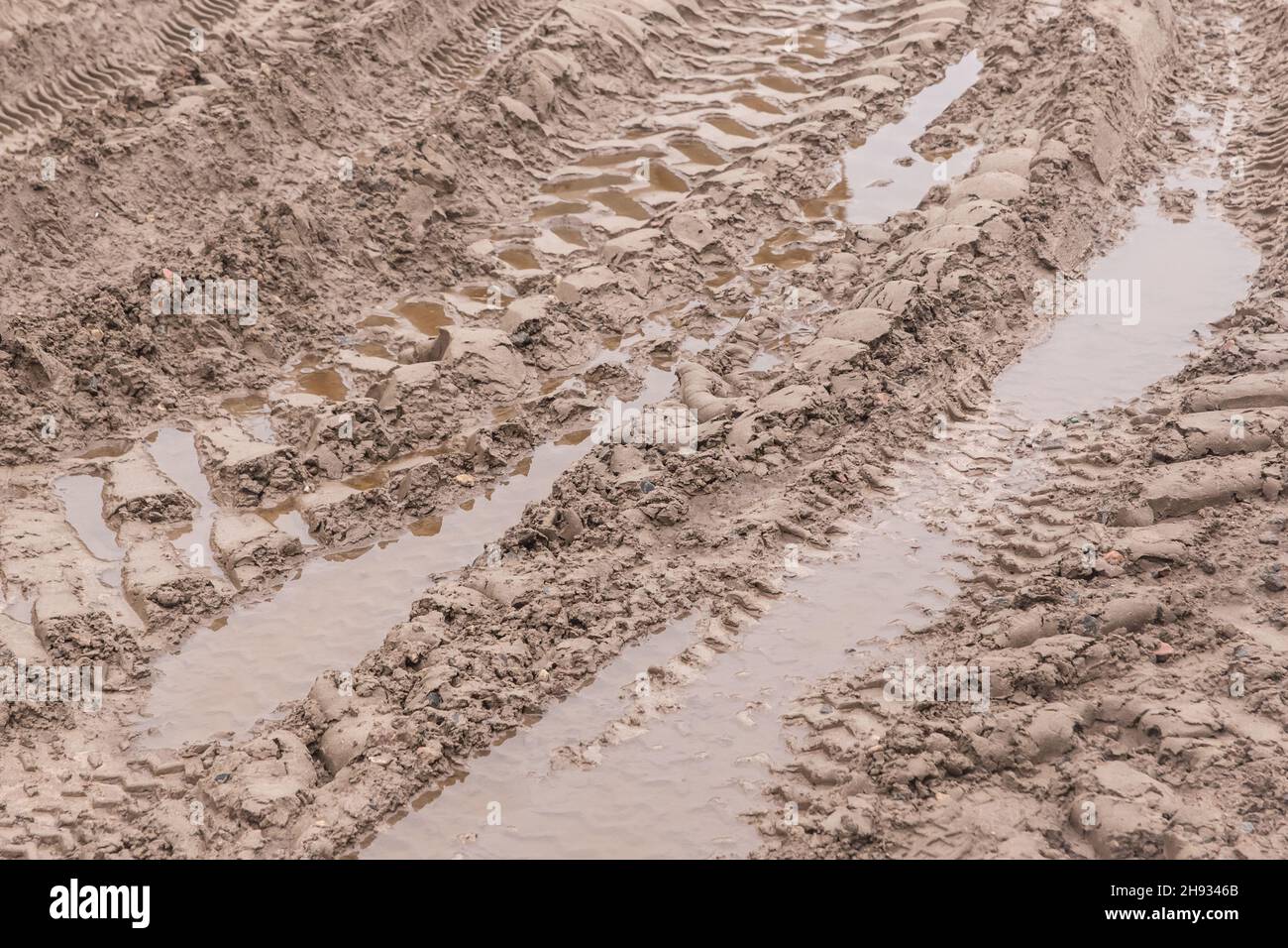 Track pattern trail from vehicle on dirty sandy road soil from wheel ...