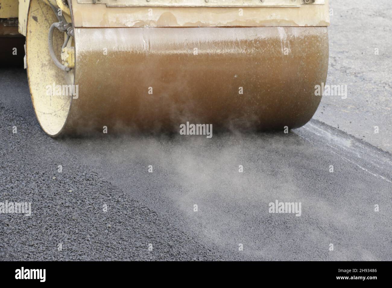 Compact steamroller flatten out the asphalt. Heavy Vibration roller at ...