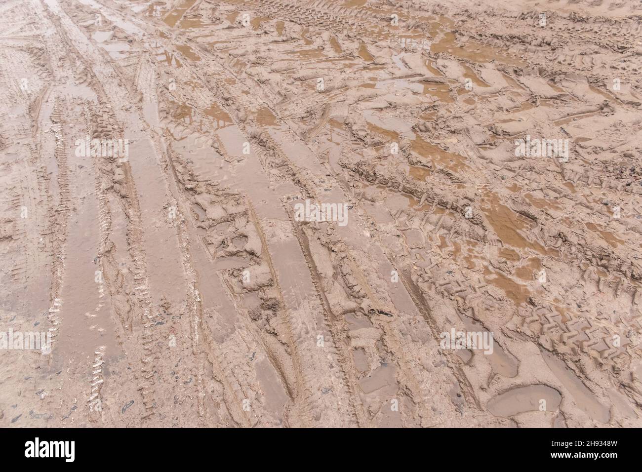 Track pattern trail from vehicle on dirty sandy road soil from wheel ...