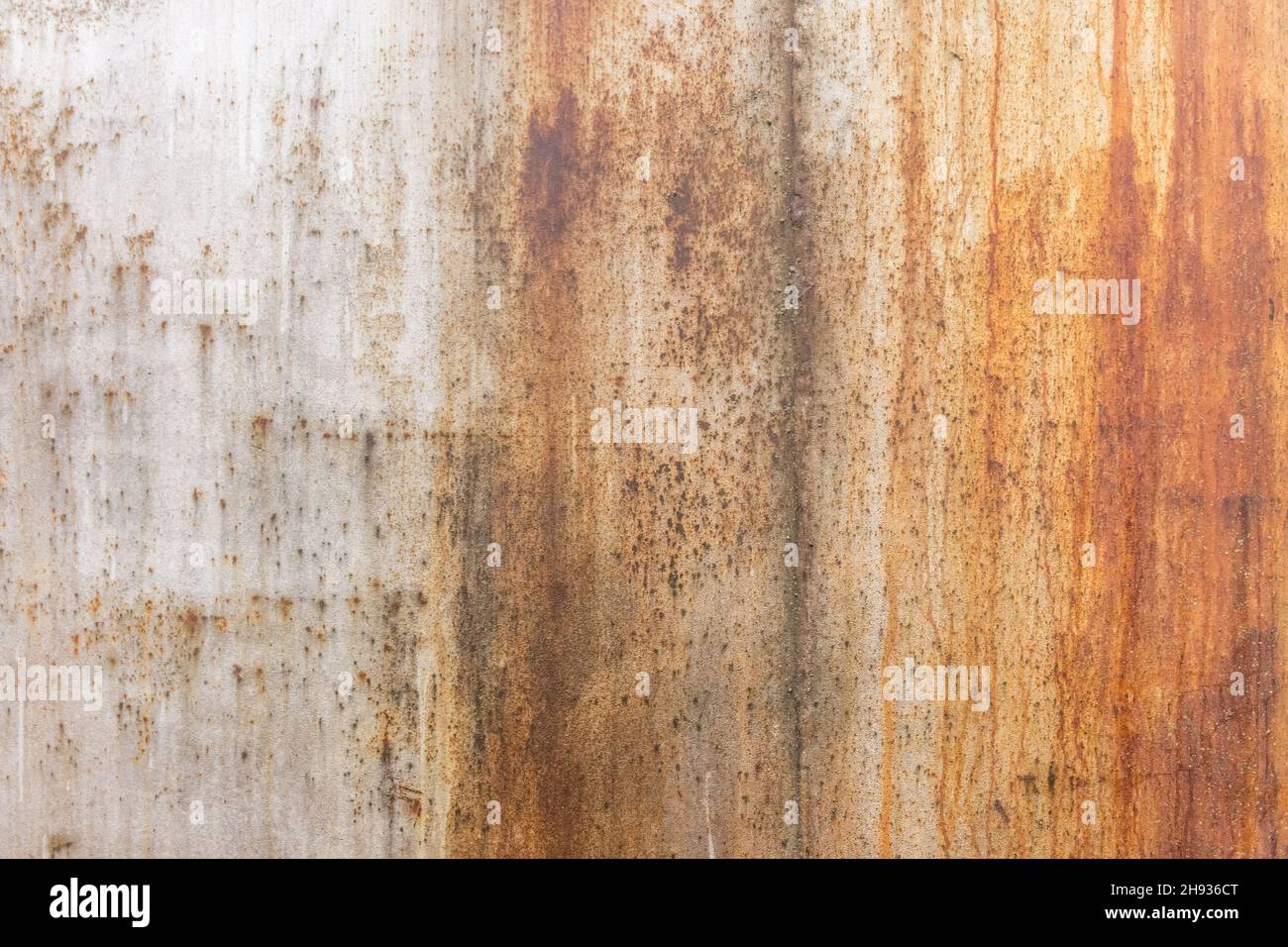 Orange or yellow old rusty dirty metal surface with abstract worn iron ...