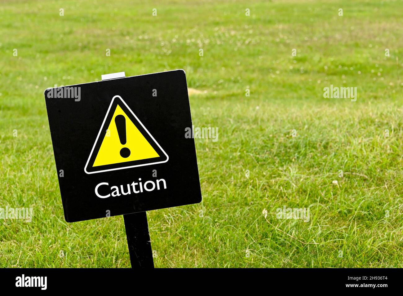 Warning sign in an outdoor area. No people. Copy space Stock Photo - Alamy