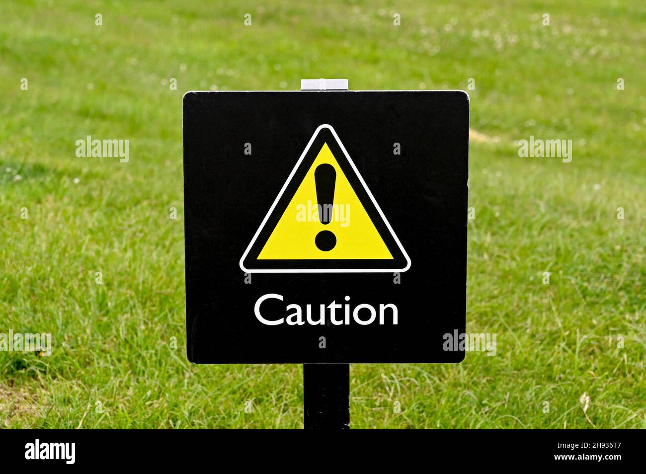 Warning sign in an outdoor area. No people. Copy space Stock Photo - Alamy