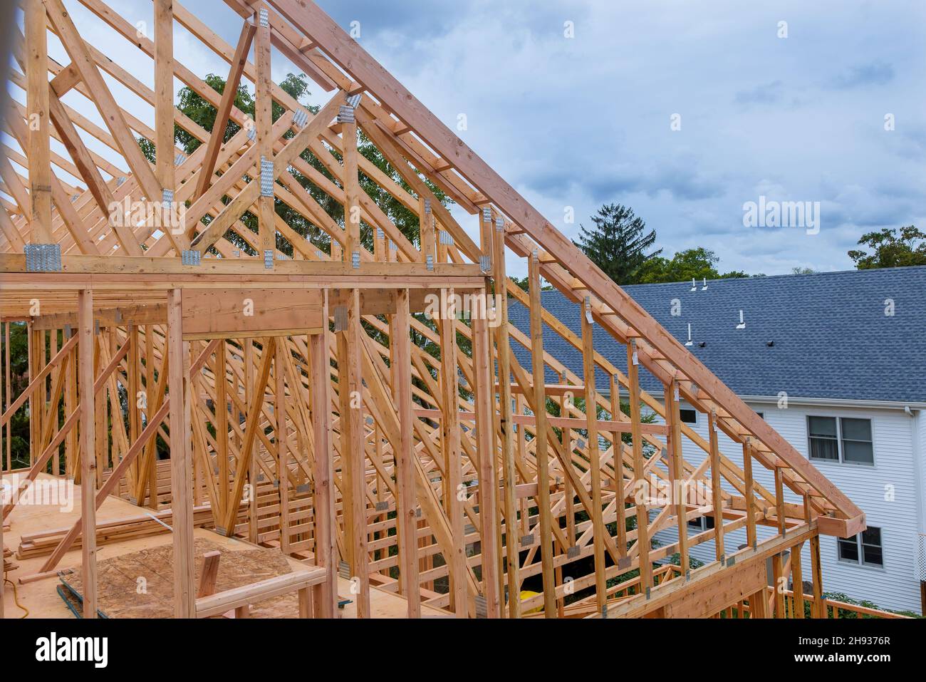 Framing beam of new house under construction home framing Stock Photo ...