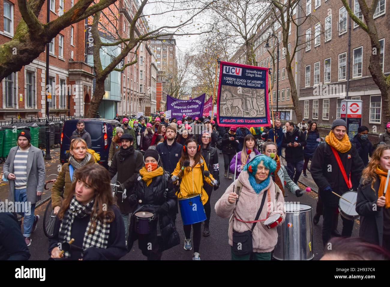 London, UK. 03rd Dec, 2021. Protesters march past the University of ...