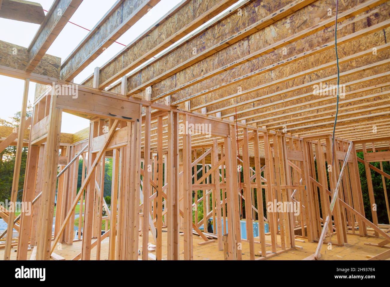 Wooden house frame structure on a new development Stock Photo - Alamy
