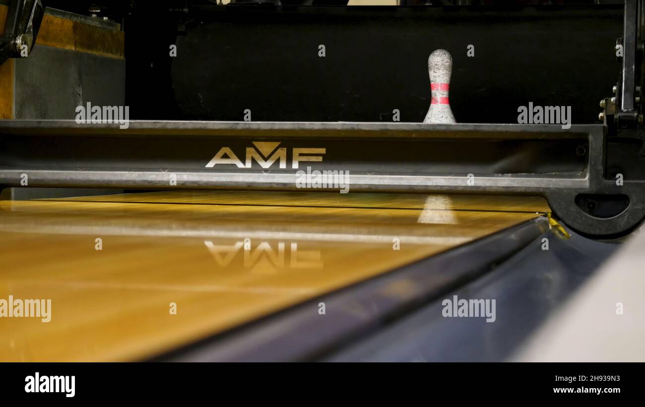 Bowling ball knocks down pins. Media. Bowling ball on the track in ...