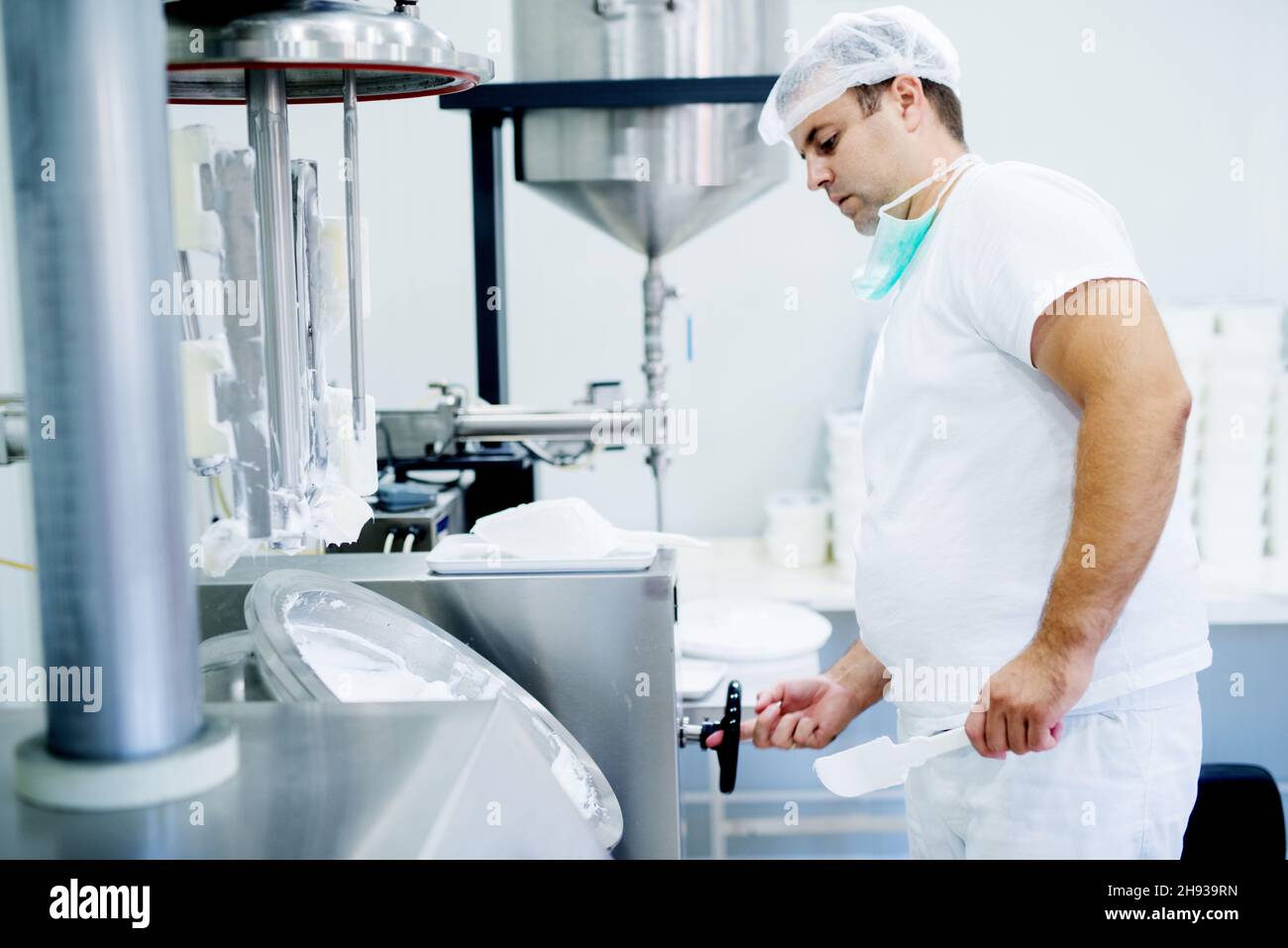 Production and checking of cosmetics products Stock Photo - Alamy
