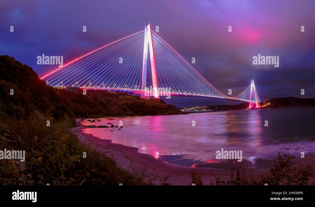 Yavuz Sultan Selim Bridge in evening illumination. Suspension bridges ...