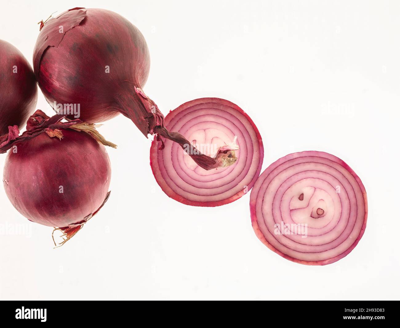Food close-up still-life of Red Onions against a plain background Stock ...