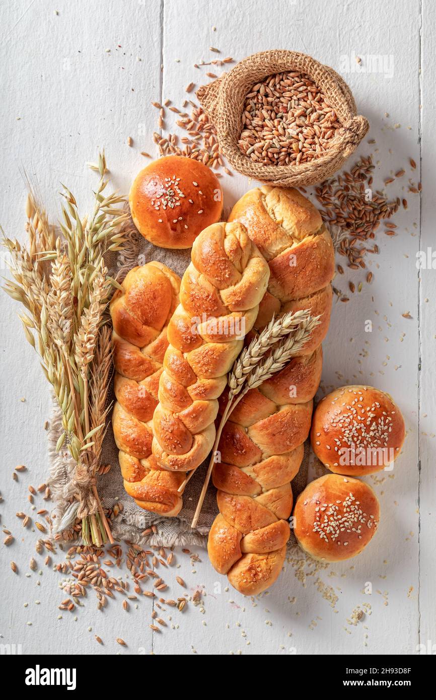 Golden variety of breads freshly baked in home bakery. Variety of ...