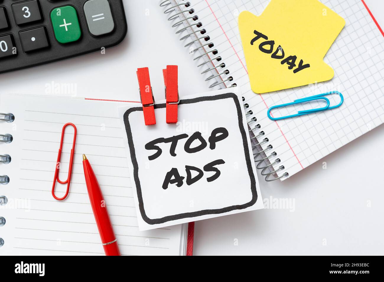 Hand writing sign Stop Ads. Word Written on program that will remove ...