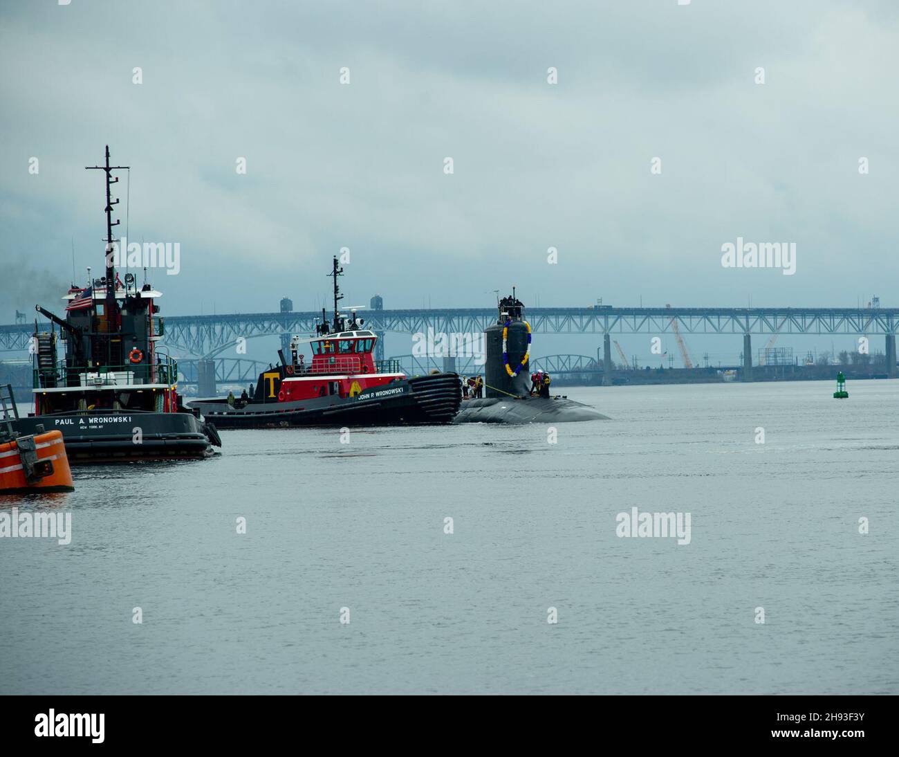 211126-N-EJ843-0006 GROTON, Conn. (Nov. 26, 2021) Tugboats guide the ...