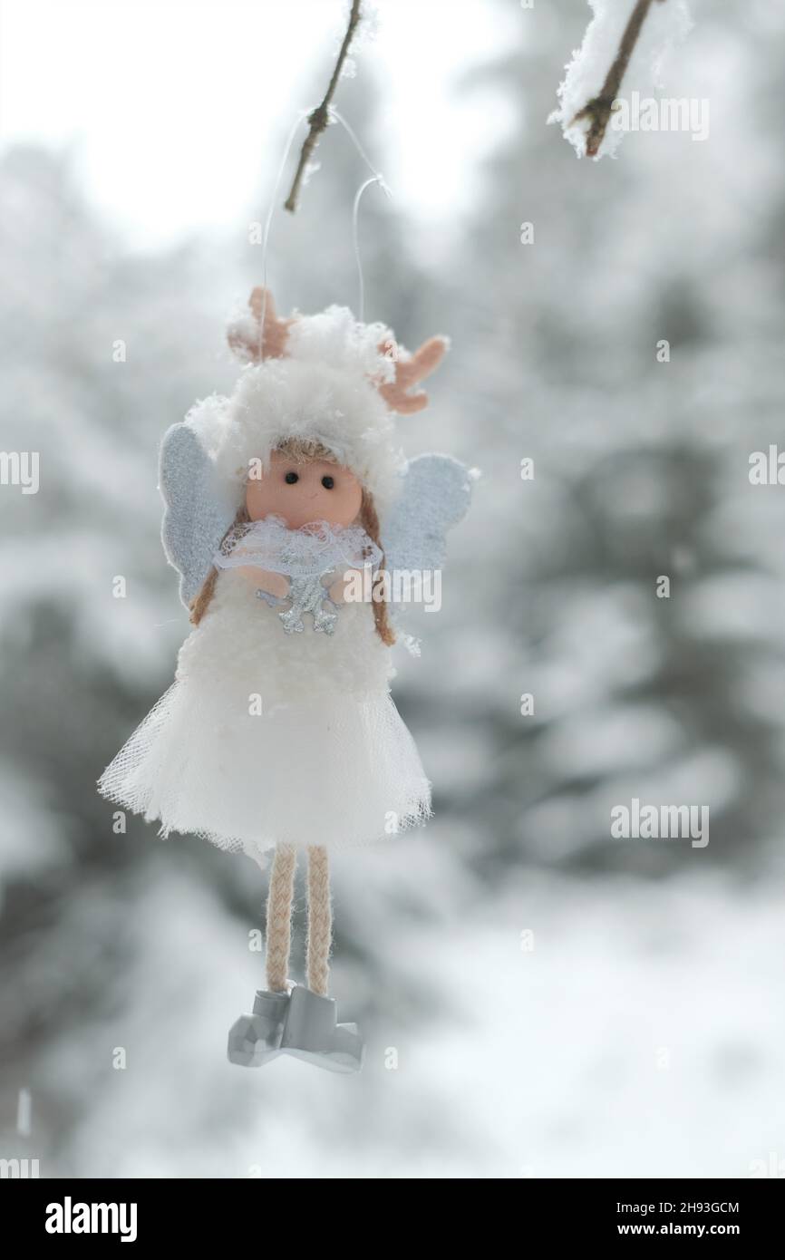 Winter angel.Christmas and New Years time.Christmas angel on a tree ...