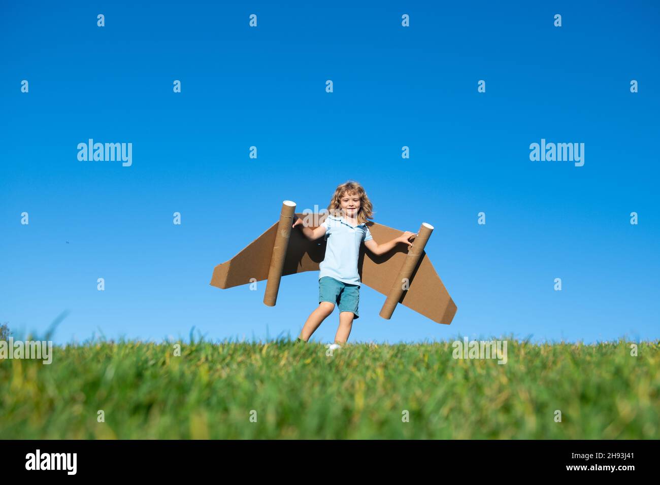 Boy child with wings at sky imagines a pilot and dreams of flying Stock ...