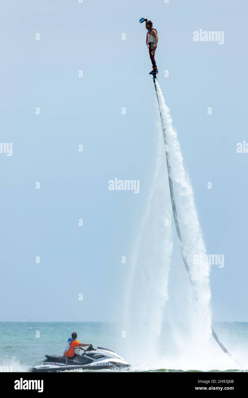Having fun at the beach with a fly board Stock Photo - Alamy