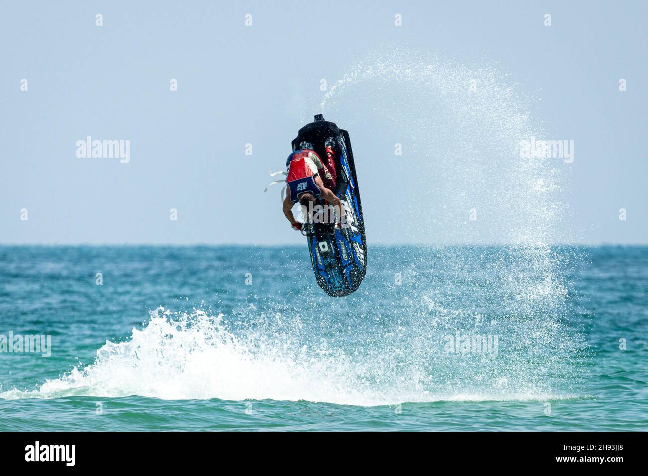 Having fun at the beach with a jet ski Stock Photo - Alamy