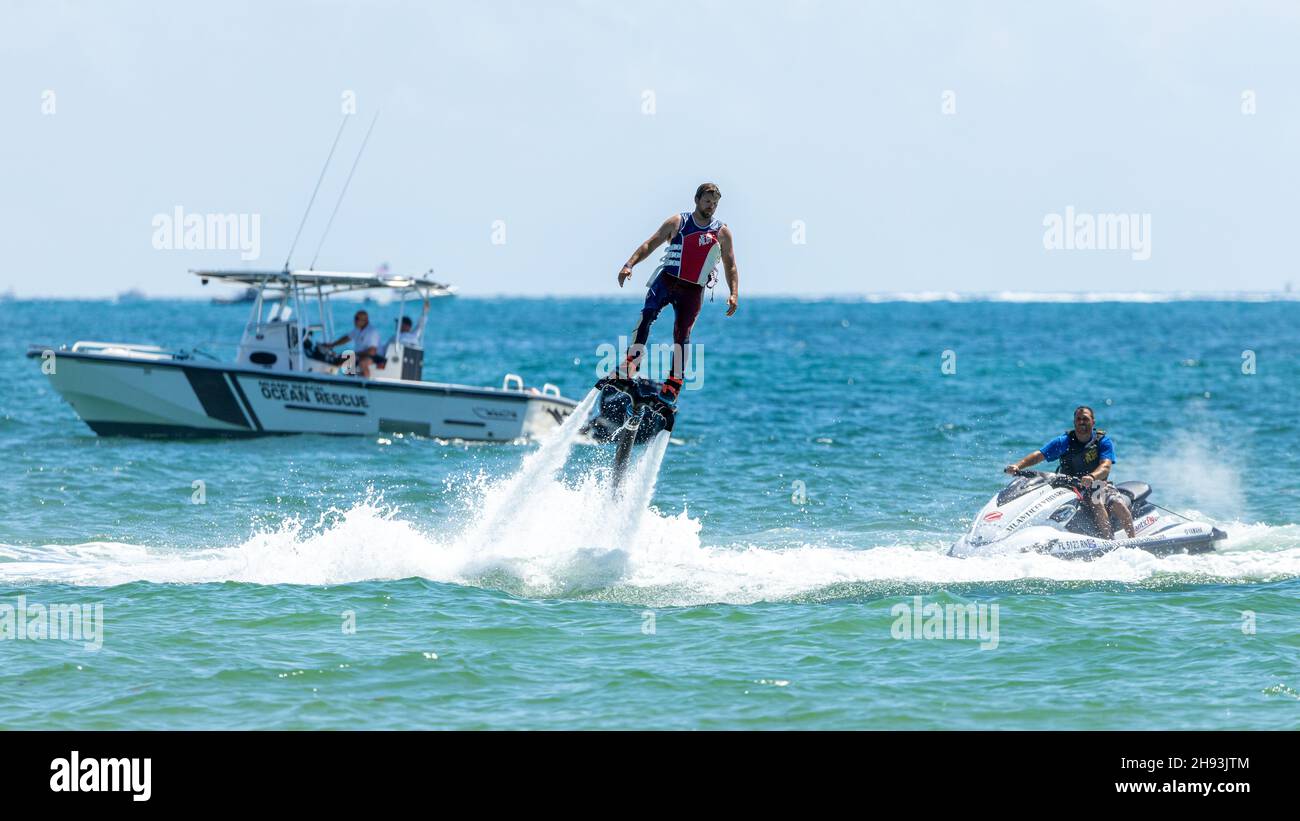 Having fun at the beach with fly boards and jet skis Stock Photo - Alamy