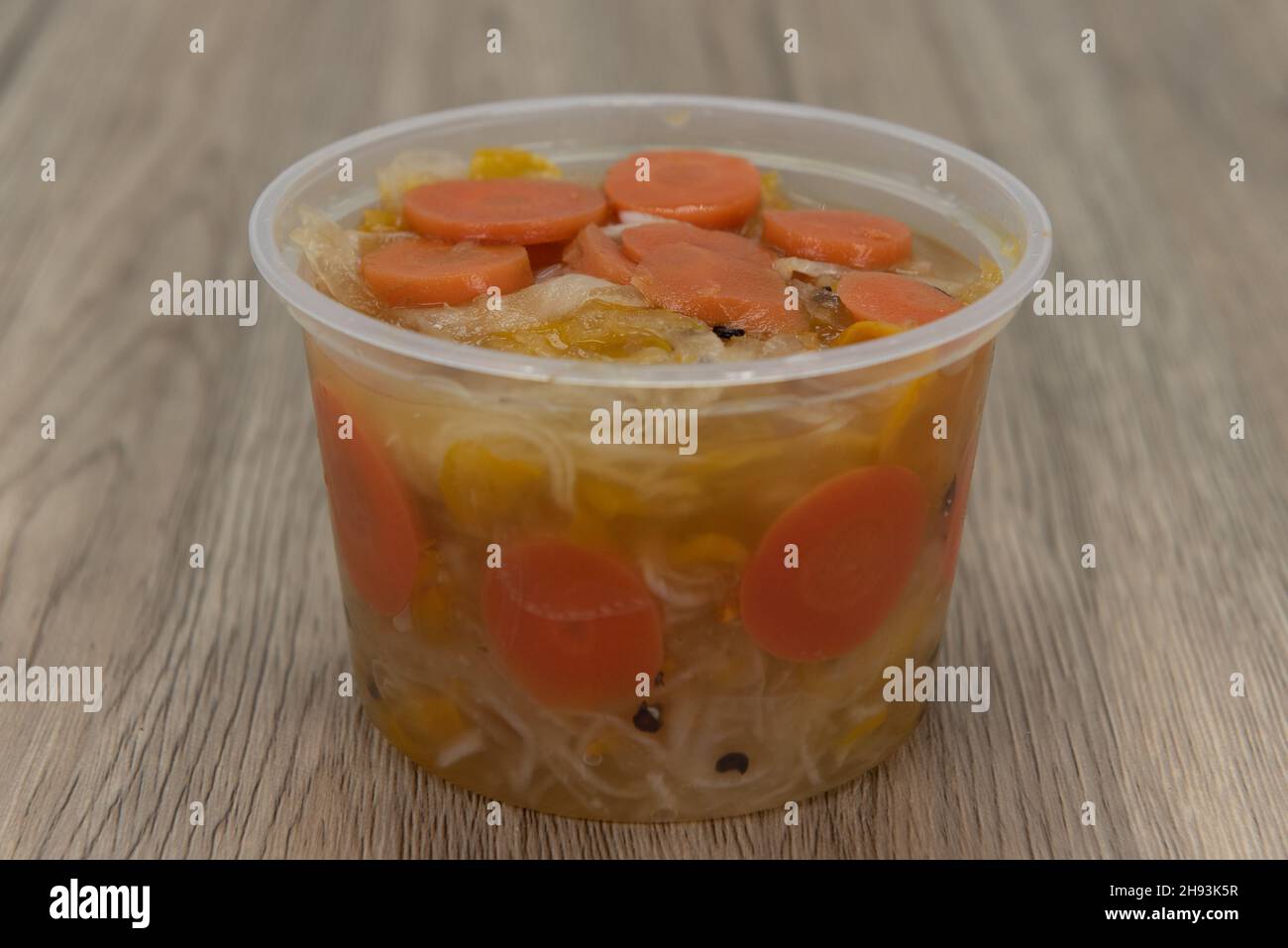 Spicy side order container of habaneros salsa to add some heat to the ...