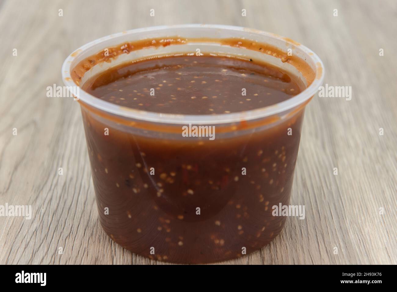 Large container of fresh homemade red salsa ready to serve as a dip ...