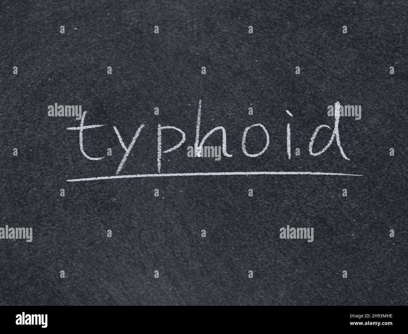 typhoid concept word on blackboard background Stock Photo - Alamy