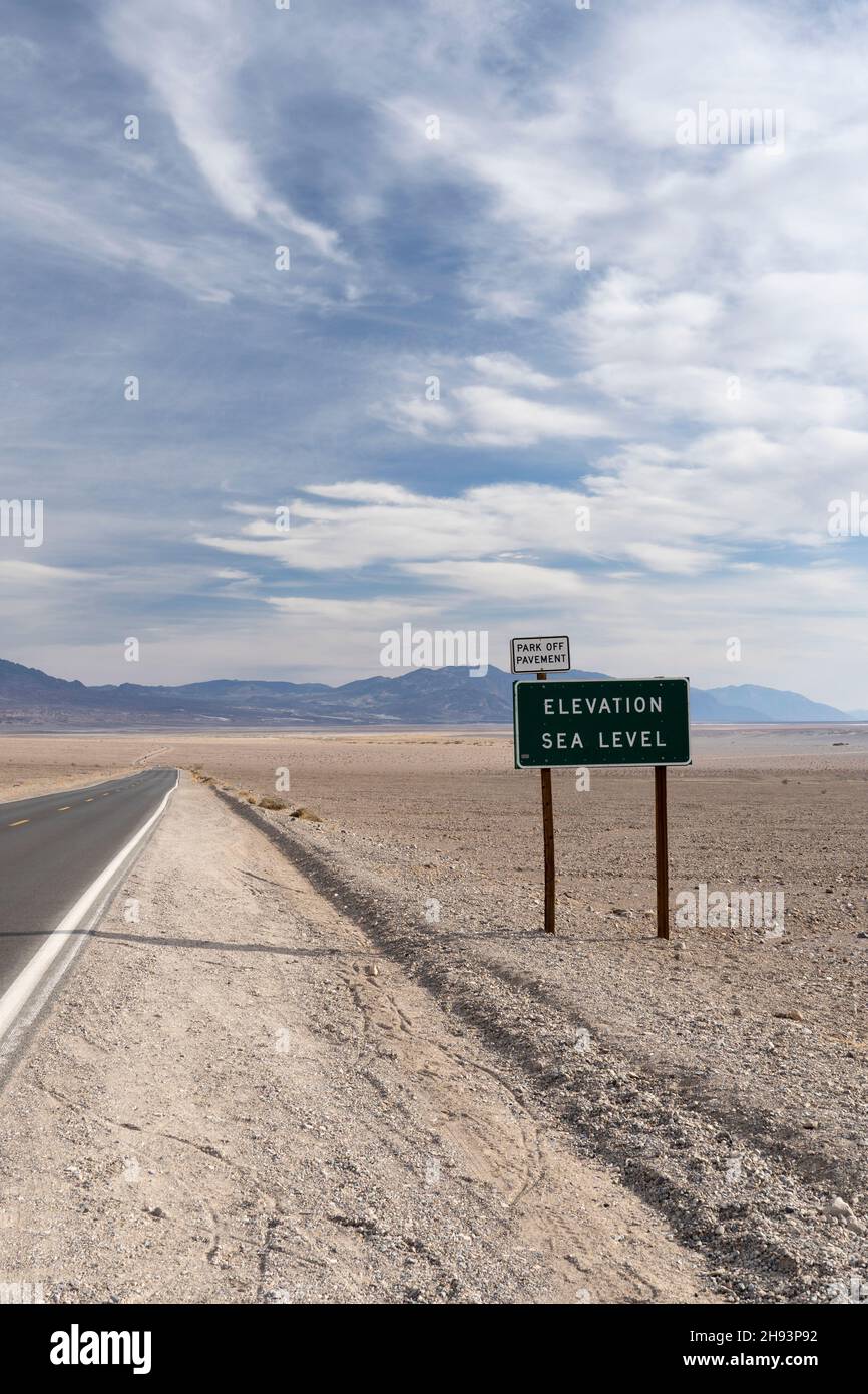 Highway sign depicting sea level in Death Valley, California, USA. Much ...
