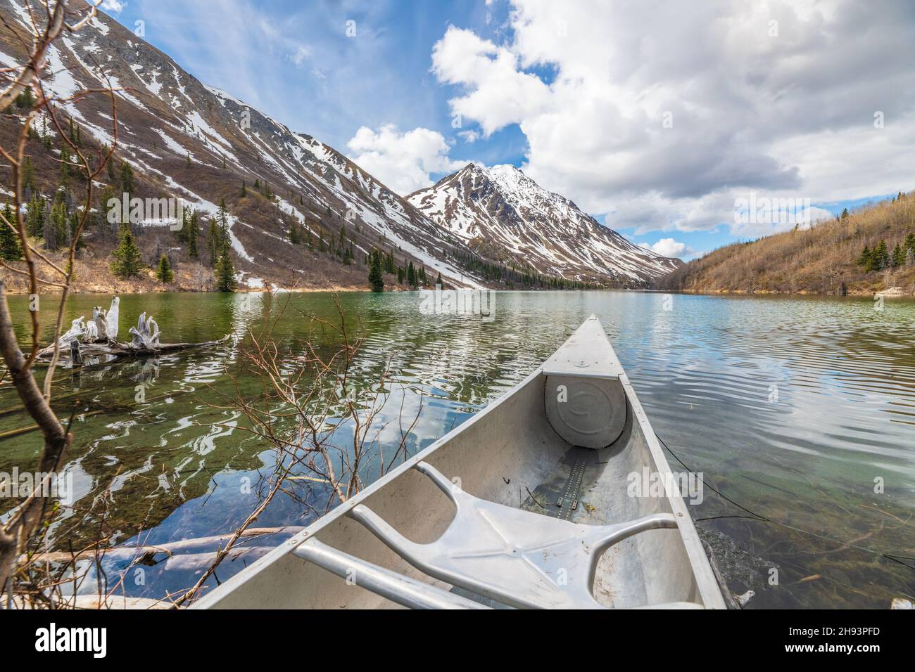 Isolated wilderness lake seen in Canada with a steel framed canoe in ...