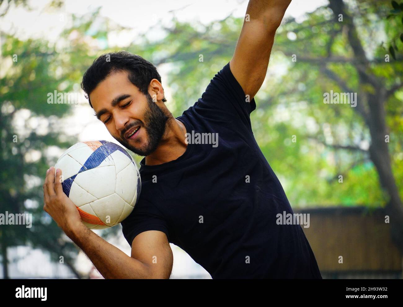 People Playing Football In Action
