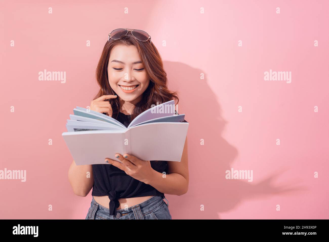 Female asian model reading a book hi-res stock photography and images ...