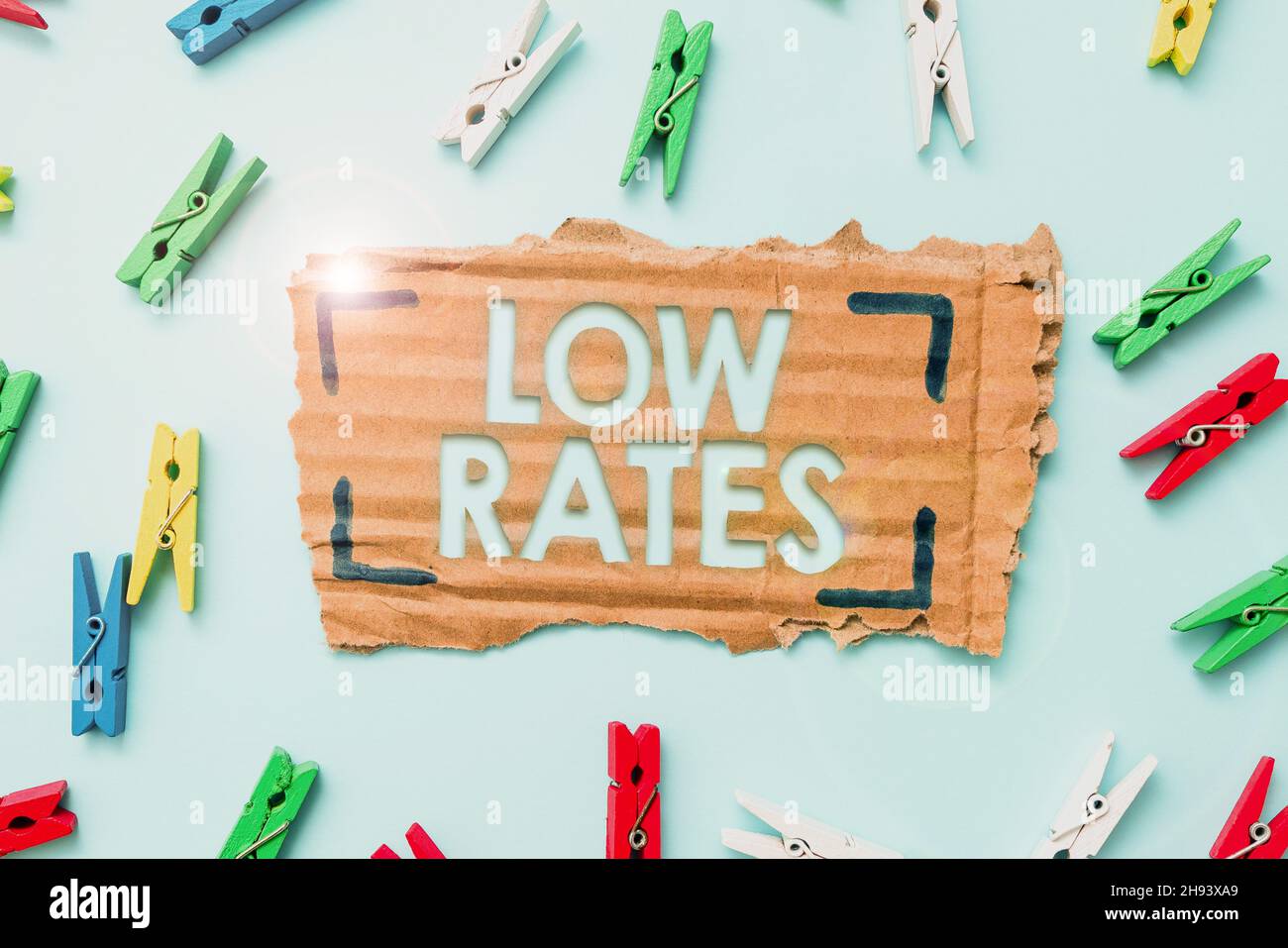 Text sign showing Low Rates. Concept meaning A cost of an item or ...